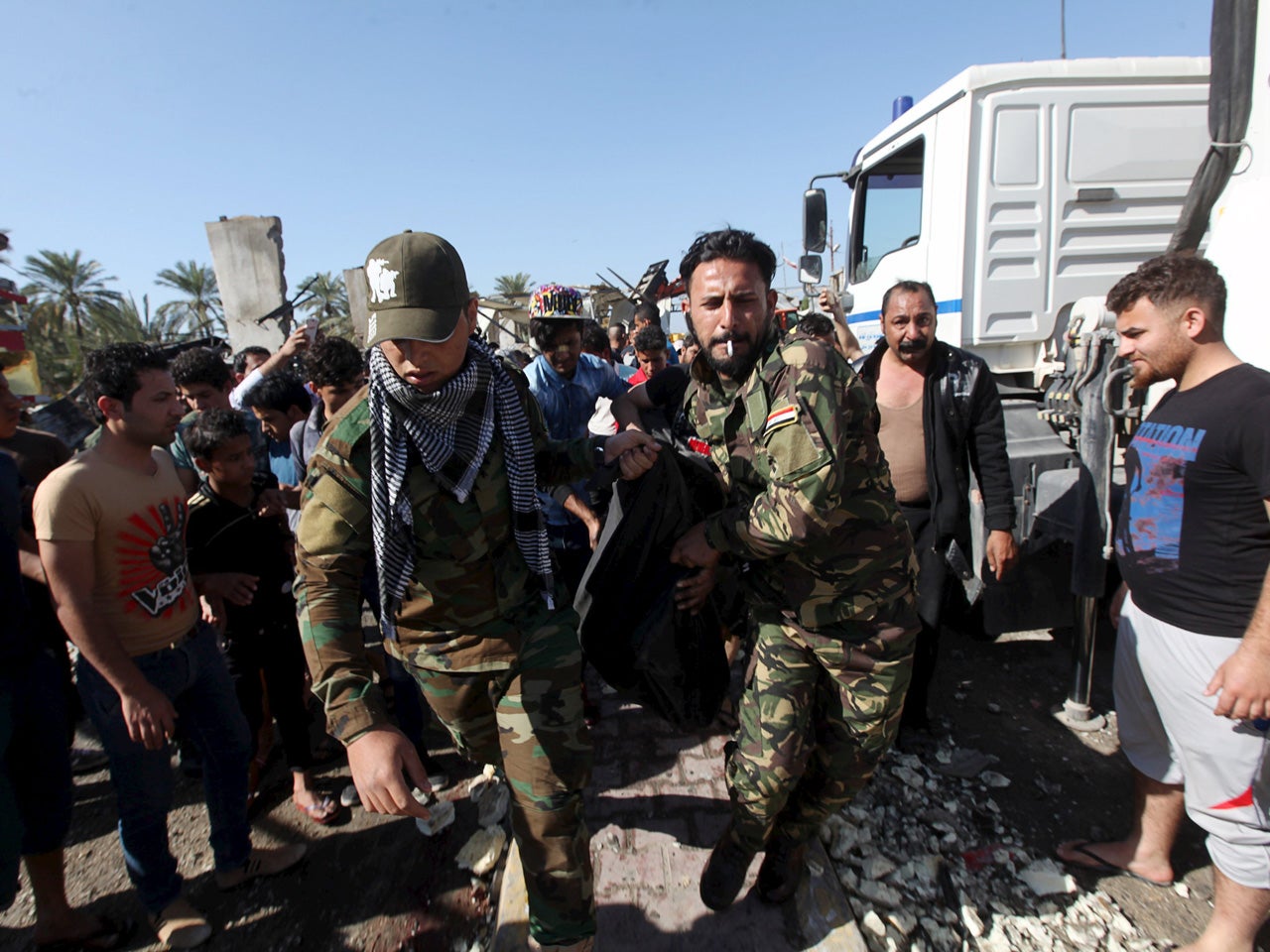 ISIS suicide bomber kills 47 near Baghdad - CBS News