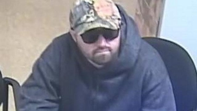 "Bearded Bandit" arrested after being spotted buying razors - CBS News