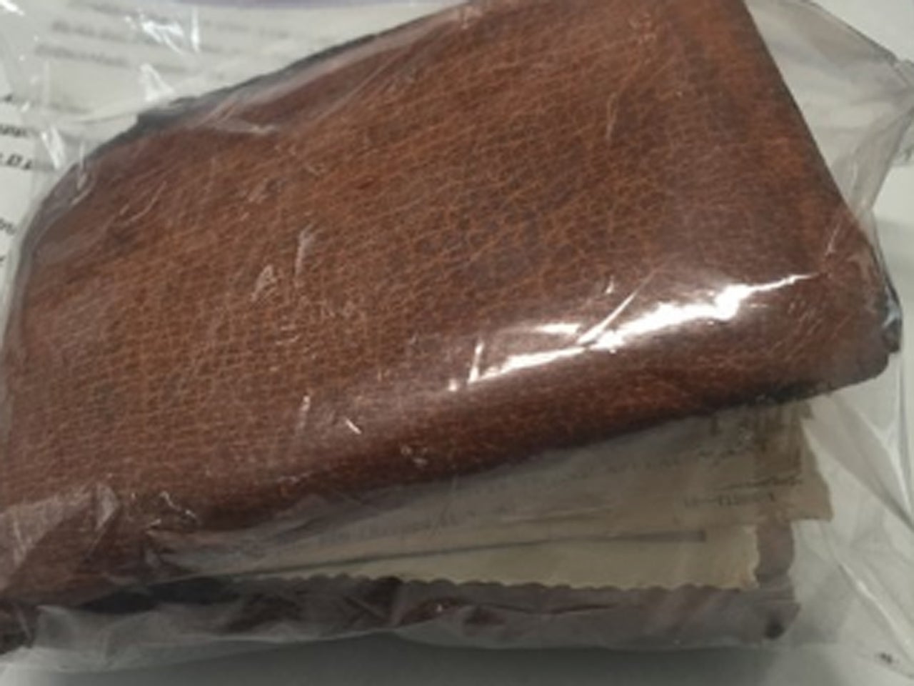 Mystery wallet's history shocks homeowner after 58 years - CBS News