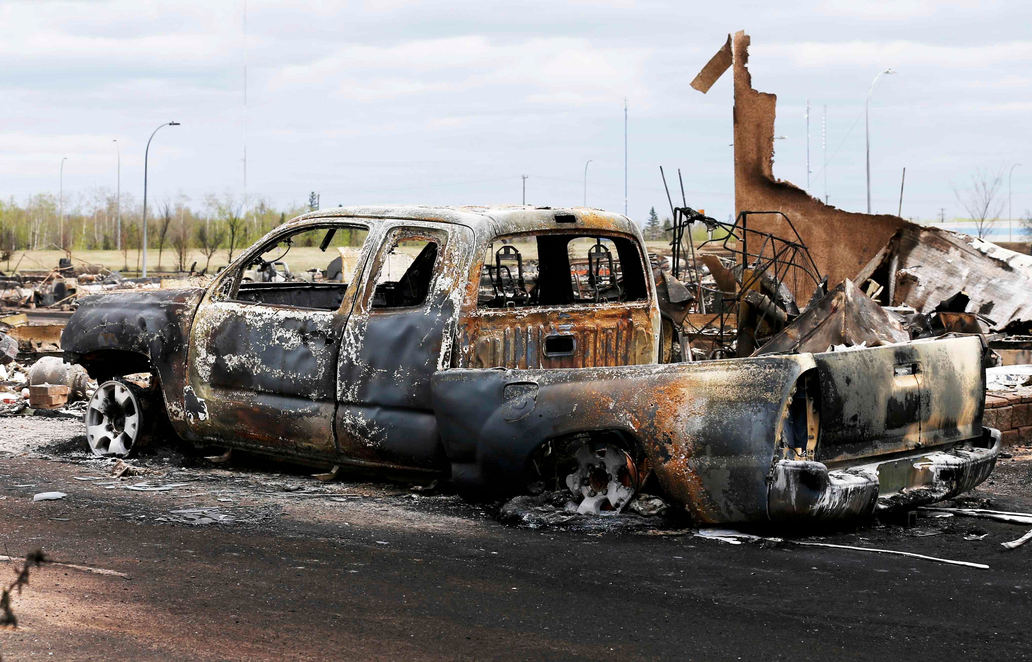 Canadian firefighters making progress on explosive wildfire - CBS News