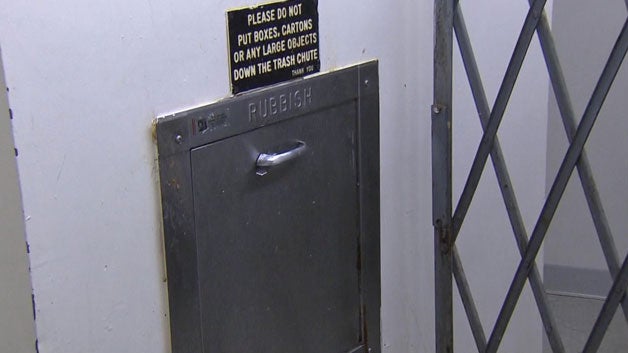 Woman's leg mangled in fall into trash compactor - CBS News