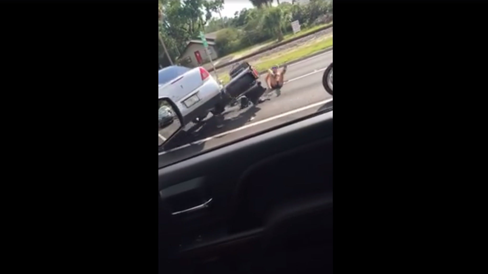 Video: Vet motorcyclist run over in apparent road-rage incident - CBS News