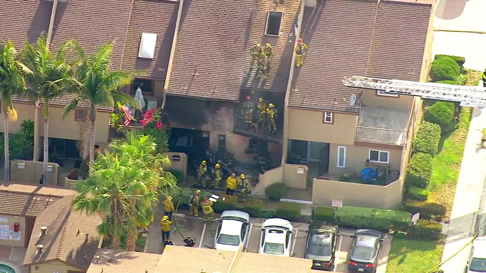 2 killed when plane crashes into Calif. apartment building - CBS News