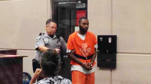 Sean Flowers, Milwaukee father, accused of wading into pond, drowning ...