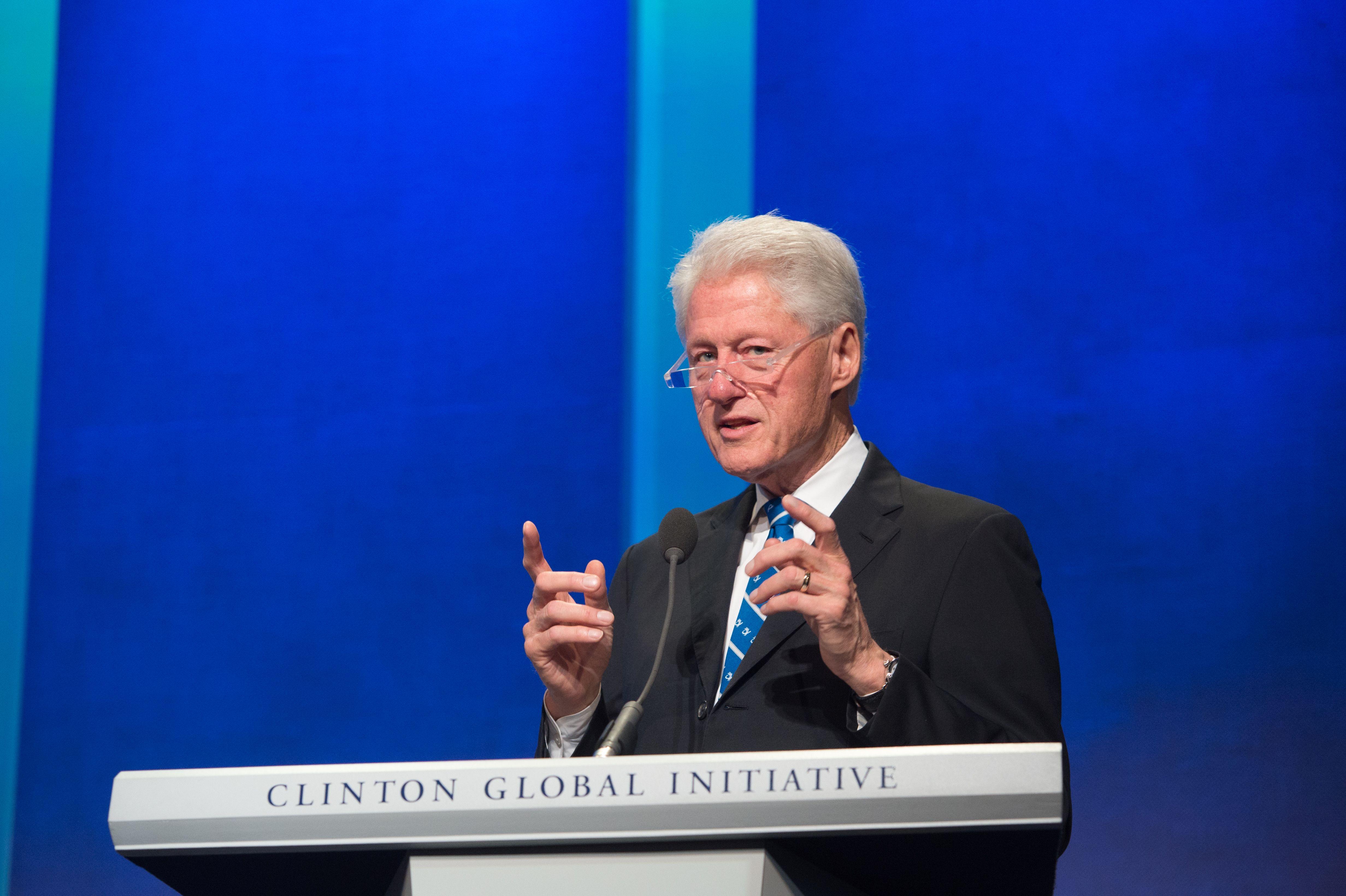 Bill Clinton delivers emotional defense of charitable foundation - CBS News
