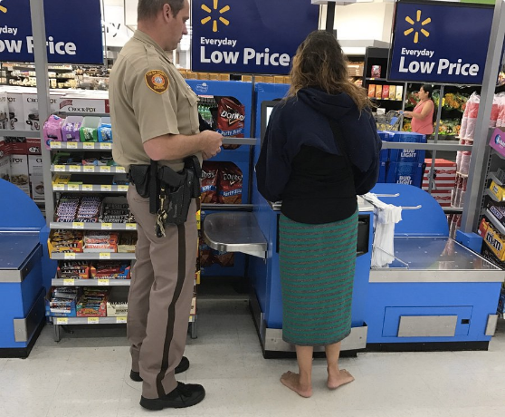 Cop stops barefoot homeless woman on the street, buys her shoes - CBS News
