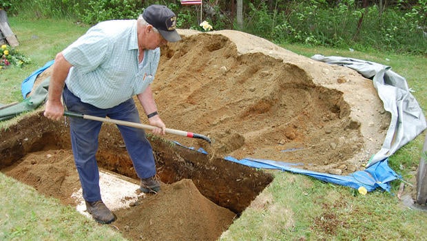 An old-school gravedigger plies his trade - CBS News