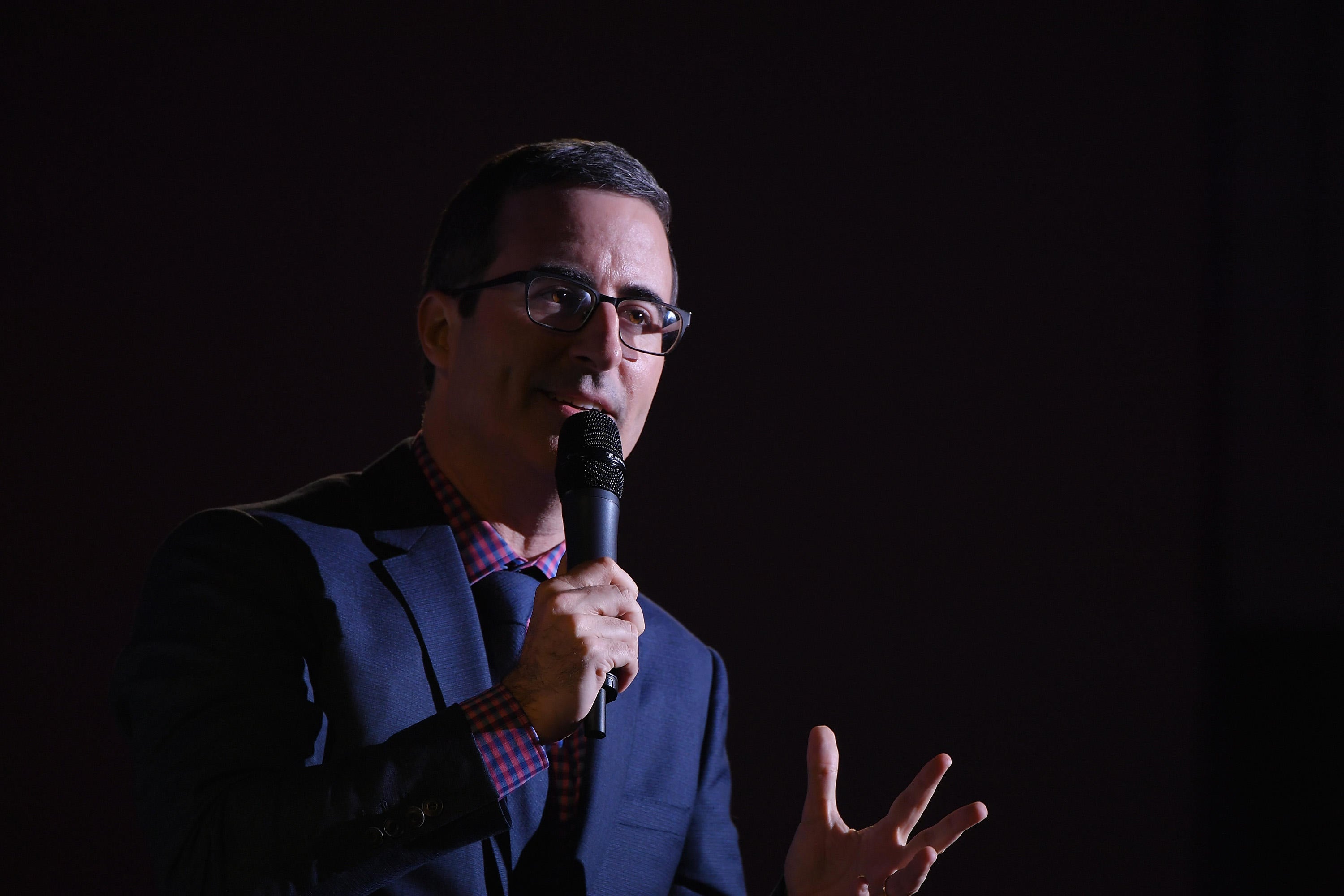 John Oliver gifts Russell Crowe's jockstrap to support Alaska Blockbuster store - CBS News