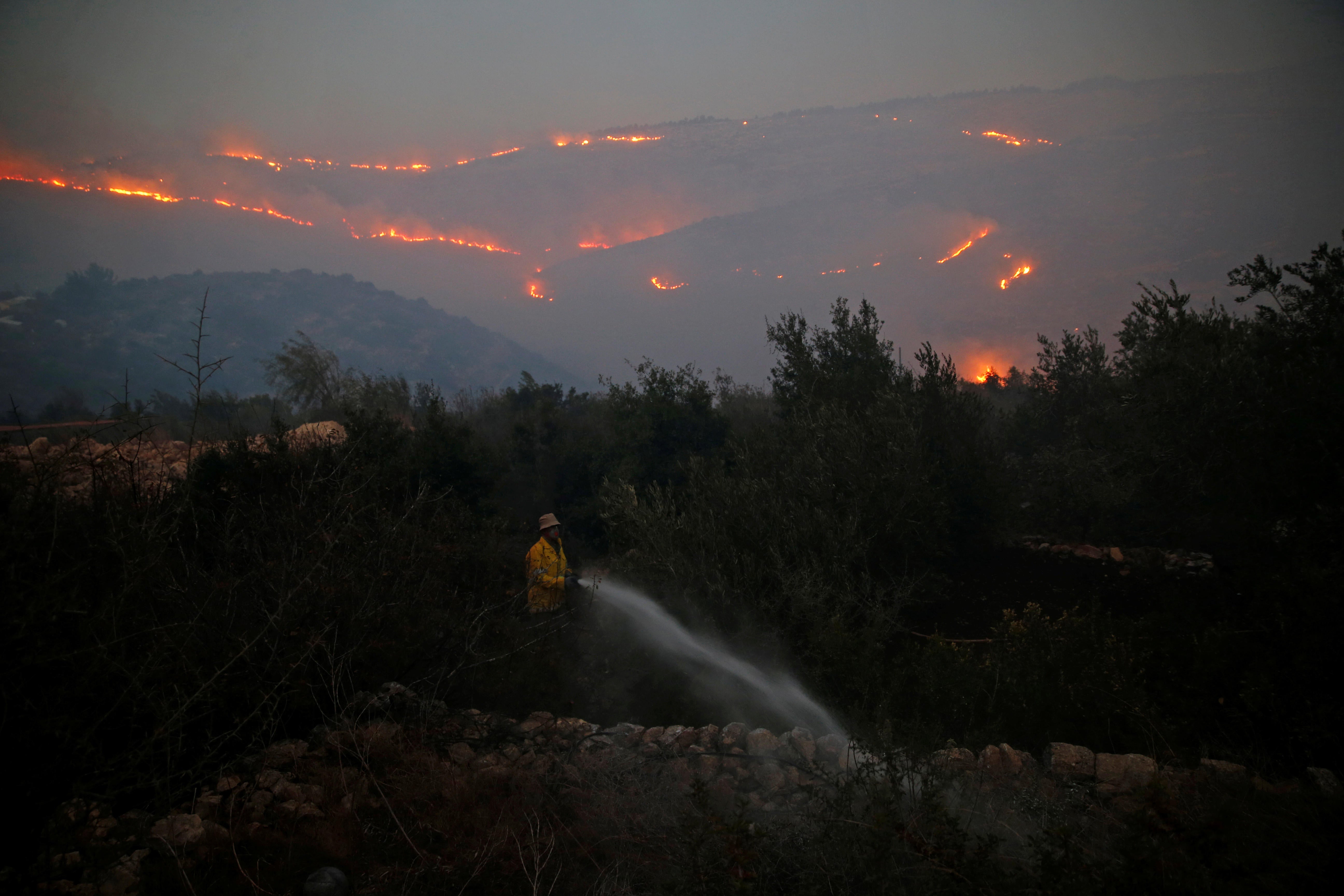 Haifa fire overcome but blazes rage elsewhere in Israel - CBS News
