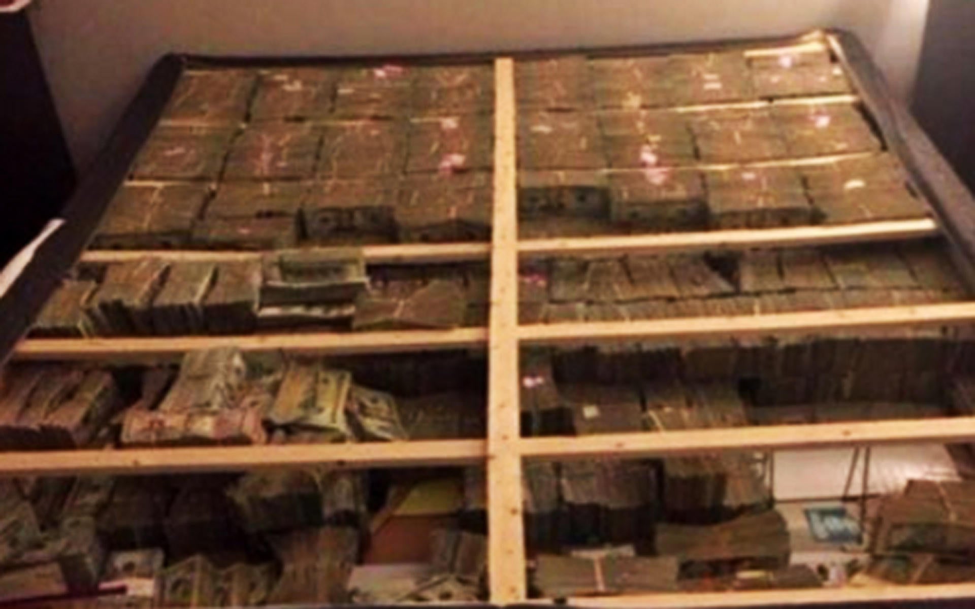 $20 million cash found stashed in box spring, authorities say - CBS News