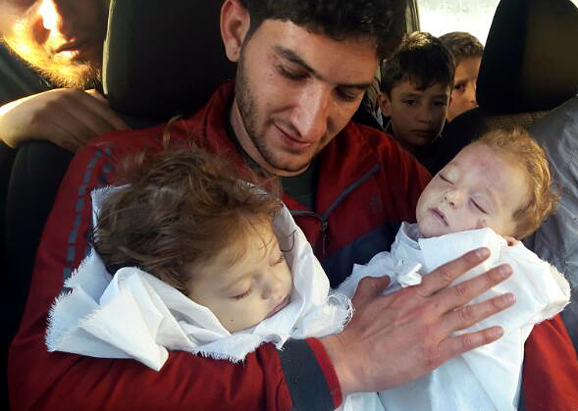 Chemical attack: Syria father says goodbye to twin children in ...