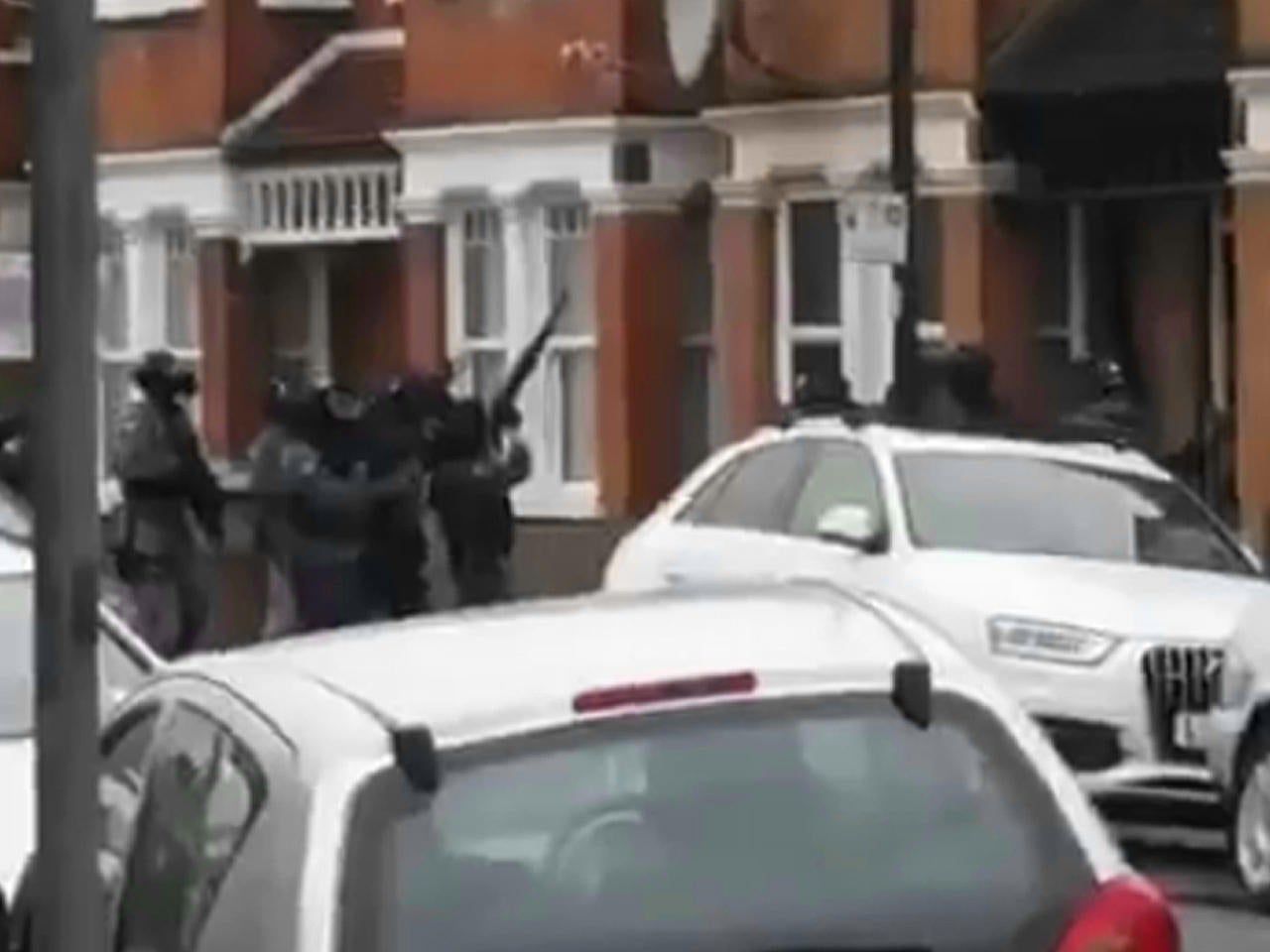 London police terror raids leave woman shot, others arrested on ...