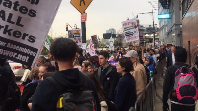 Throngs of protesters crowd street as Trump visits New York City - CBS News