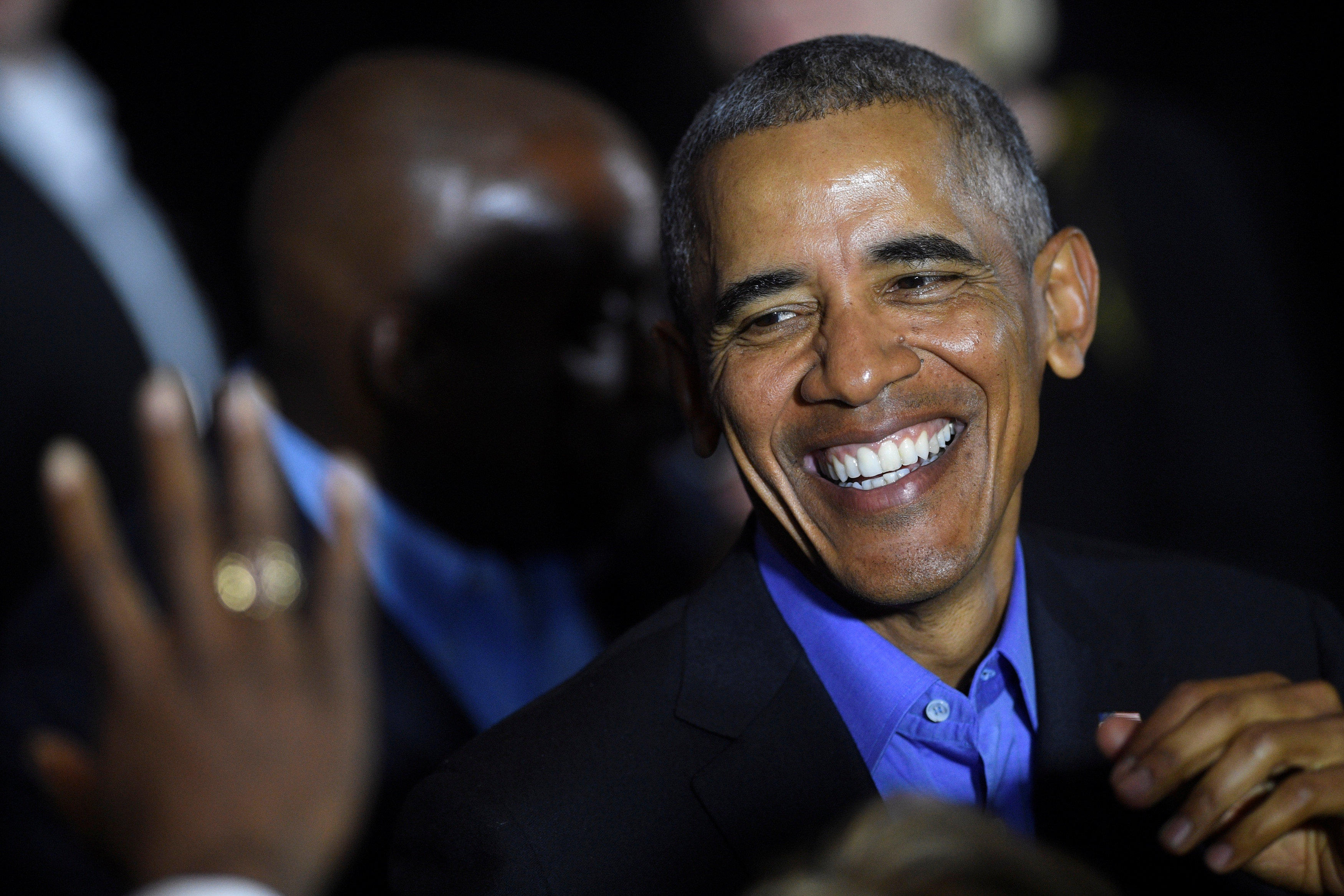 Obama returns to global stage, now as a private citizen - CBS News