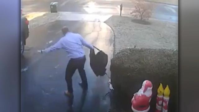 Viral video shows man's valiant attempt not to fall on driveway ice in ...