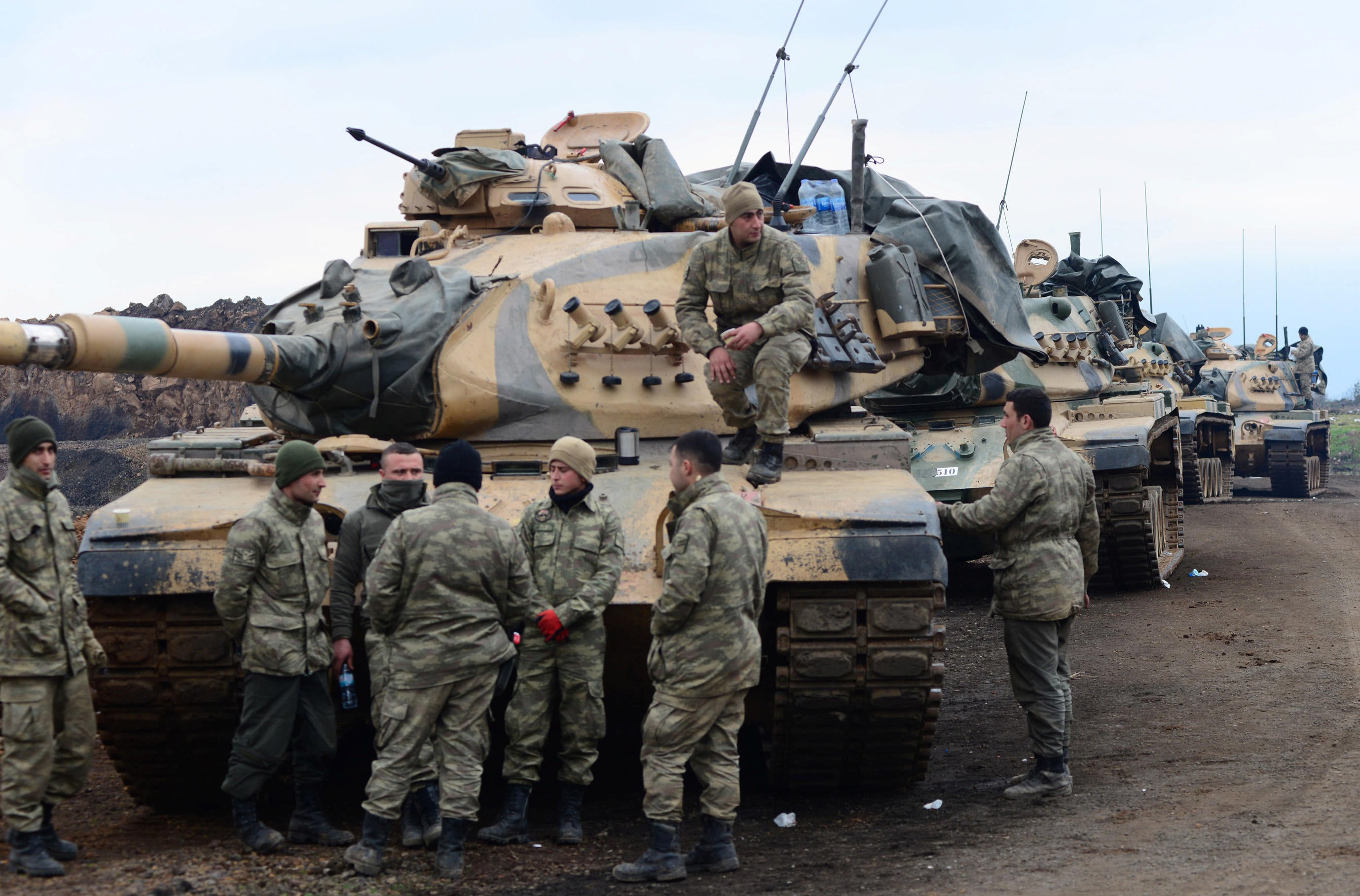 Turkish troops attack Kurdish enclave in northern Syria - CBS News
