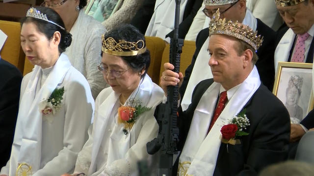 Hundreds gather at church for blessing ceremony featuring AR-15s - CBS News