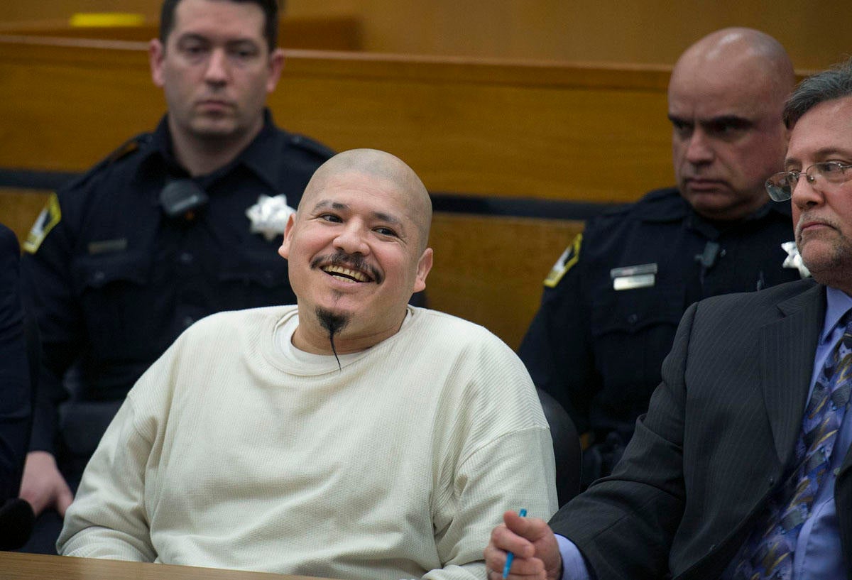 Cop killer who laughed at trial smiles as jury recommends death - CBS News