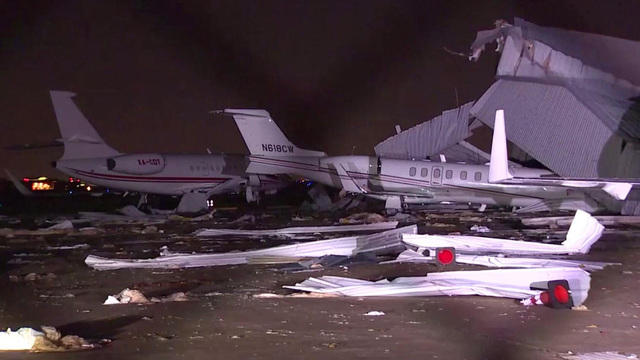 Airport hangar collapses during strong storm in Houston, crushing ...