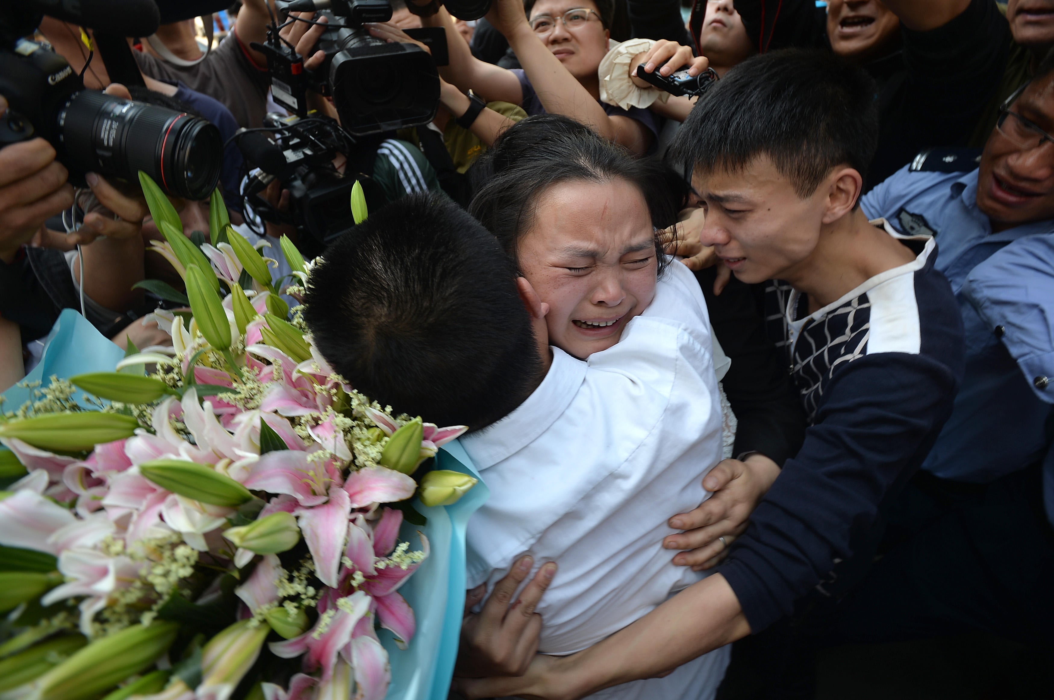 Family reunites with long-lost daughter after 24-year search - CBS News