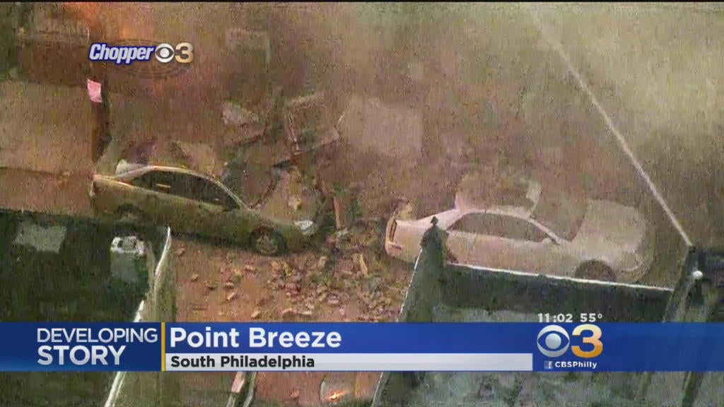 Philadelphia house explosion: Father, son survive collapse - CBS News