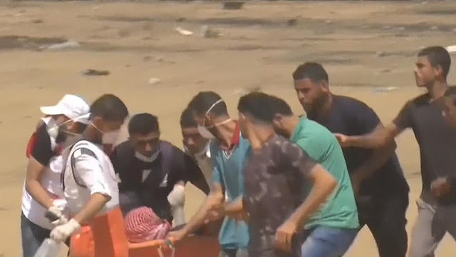 Israeli military doubling troop positioned along Gaza, West Bank - CBS News