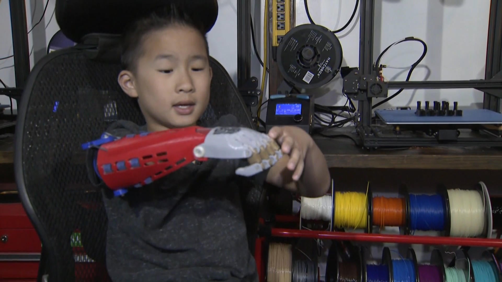 Boy missing part of his arm gets 3-D printed "upgrade" - CBS News