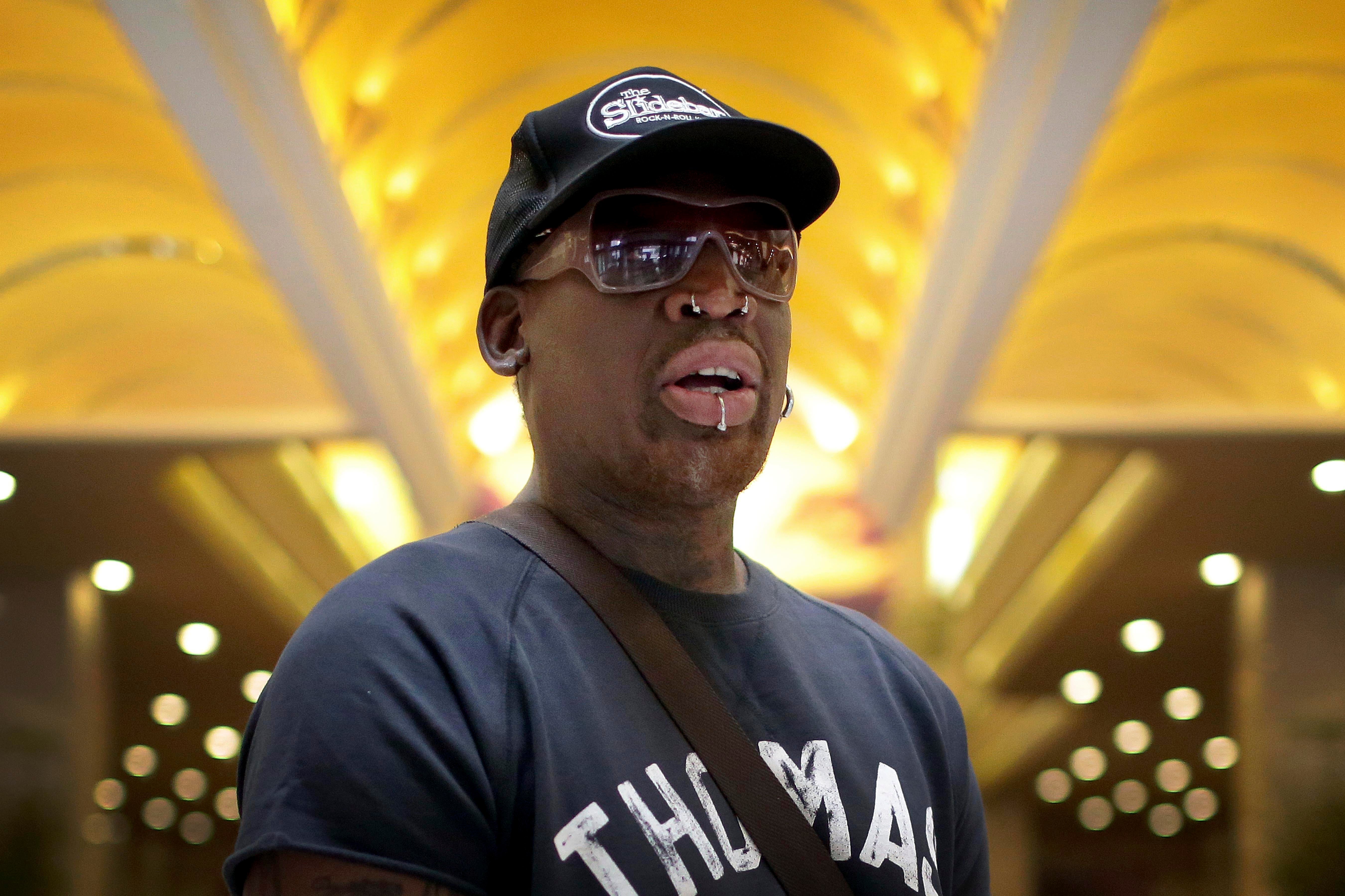 Dennis Rodman says he'll travel to Singapore for Trump-Kim summit - CBS ...