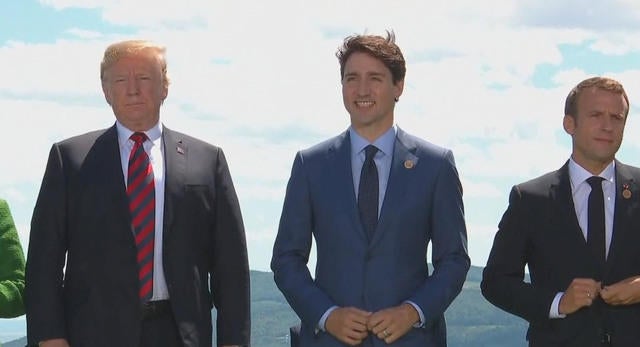Trump G7 photo: At G7 summit, Germany's Angela Merkel leans over ...
