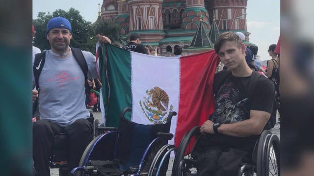 Paralyzed soccer fan donates wheelchair to Russian man during FIFA ...