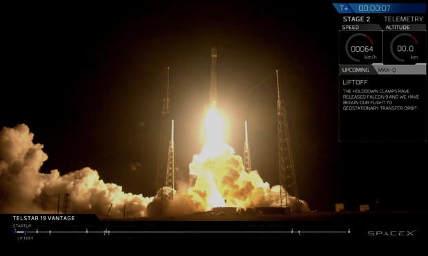 SpaceX launches heavyweight satellite, safely lands booster - CBS News