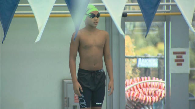 10-year-old named Clark Kent breaks record held by Michael Phelps for ...