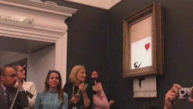 Banksy painting shredded: Buyer describes her reaction when "Girl with ...