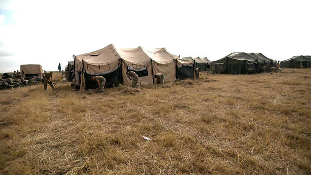 Inside Trump's military border base: Endless barbed wire, Humvees and a ...