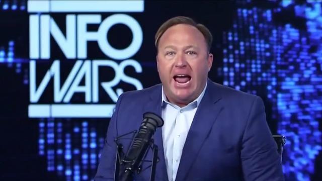 Conspiracy theorist Alex Jones arrested for DWI in Texas - CBS News