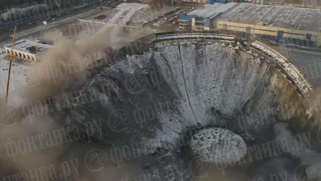 Dramatic video shows Russia stadium collapse with worker on roof - CBS News