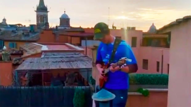 Balconies: The new performance space for musicians in lockdown - CBS News