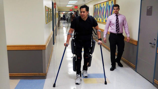 Paralyzed patients hope ReWalk exoskeleton gets approved by FDA - CBS News