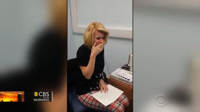 Video captures 40-year-old woman hearing for the first time - CBS News