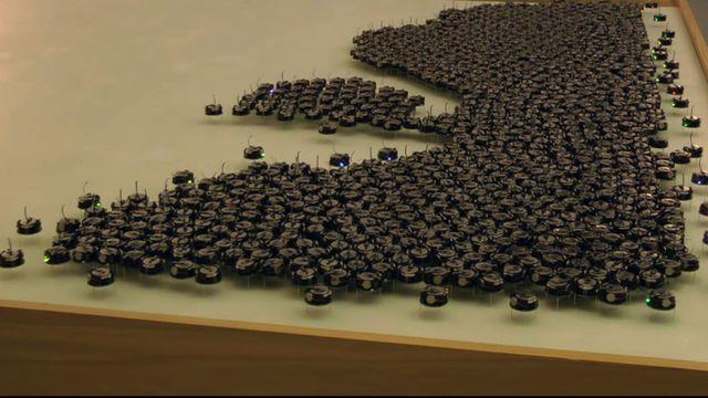 Scientists let loose a flash mob of tiny swarming robots - CBS News