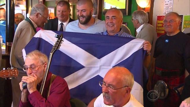 Scotland stays with the U.K., and has a pint to heal the divide - CBS News