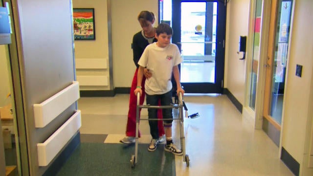 New Hampshire boy with suspected viral paralysis relearns to walk - CBS ...