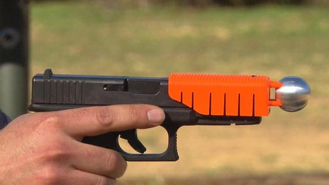 Ferguson police experiment with Alternative gun device to slow bullets ...