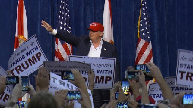 Trump fires back at disabled reporter as mocking controversy heats up ...