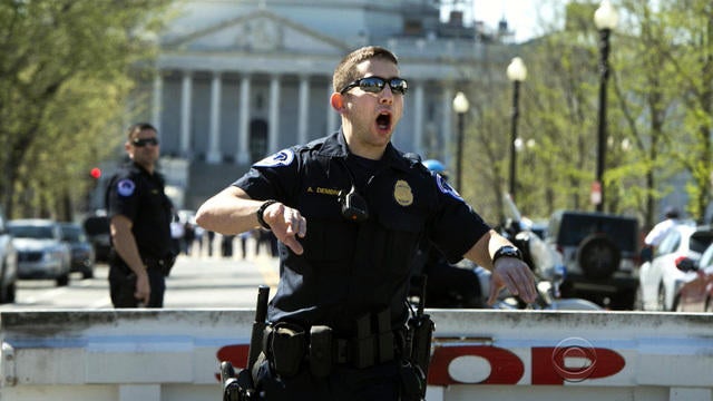 Man who drew weapon at U.S. Capitol shot by police - CBS News