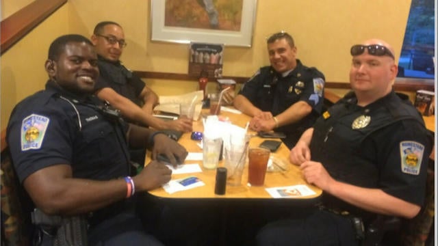 Police officers pick up couple's tab after they refused to sit near ...