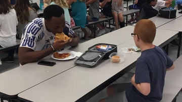 FSU player Travis Rudolph sits with sixth-grader with autism eating ...