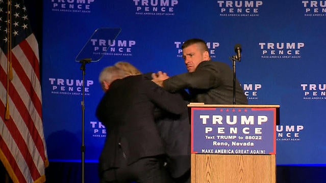 Donald Trump rushed off stage at campaign rally in Reno - CBS News