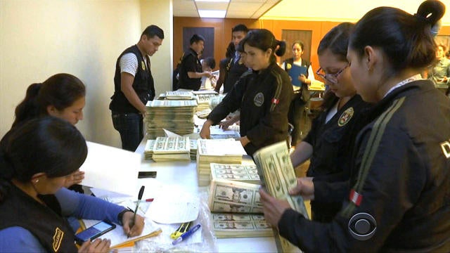 Secret Service makes massive counterfeit bust in Peru - CBS News