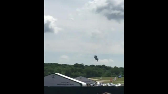 Blimp crashes near U.S. Open after catching fire - CBS News